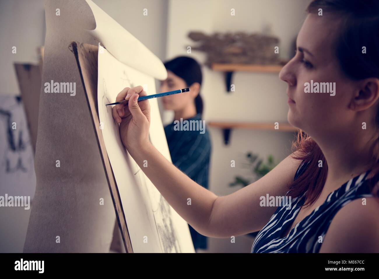 Working on painting hi-res stock photography and images - Alamy
