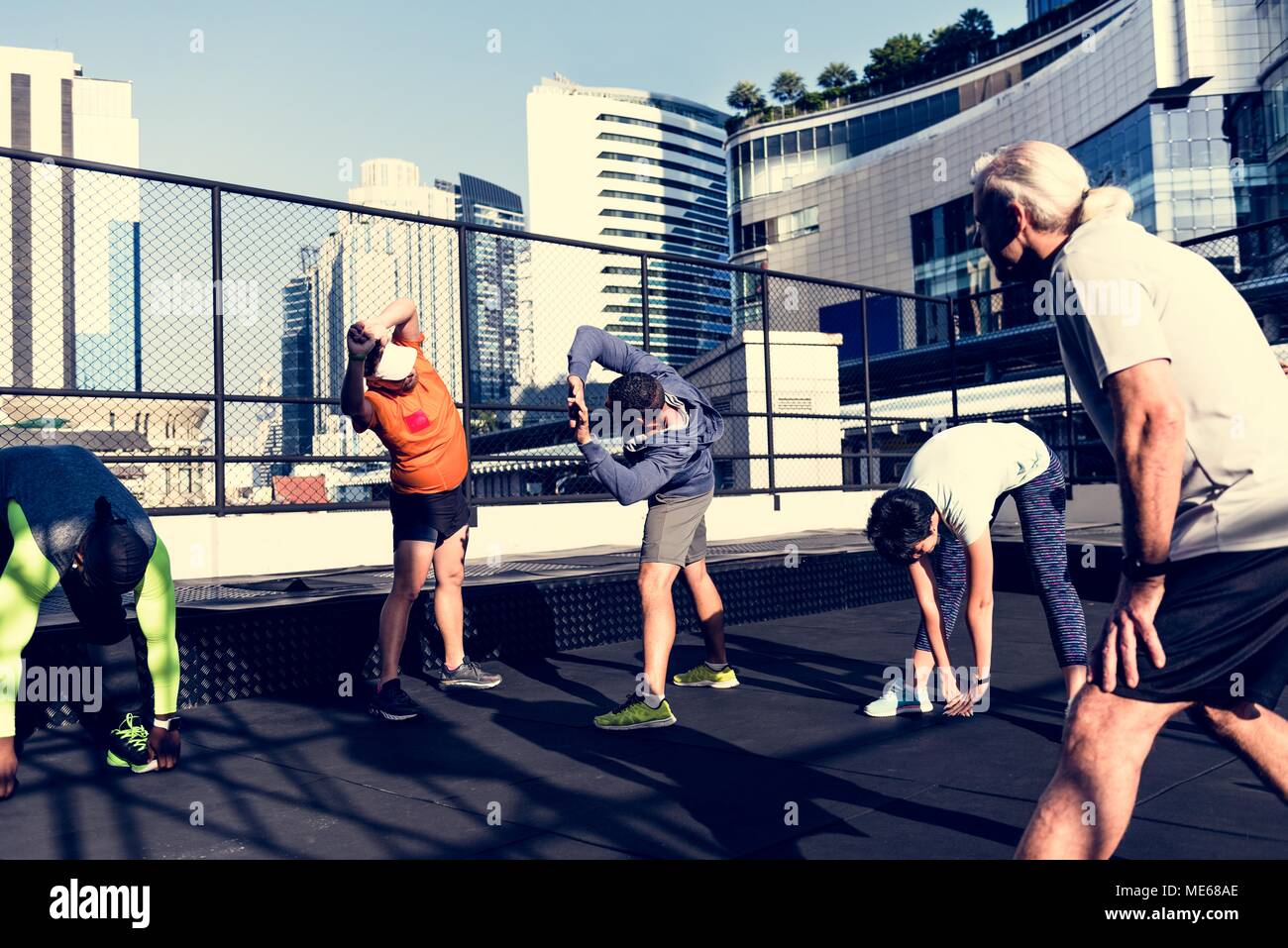 People exercising at fitness gym Stock Photo - Alamy