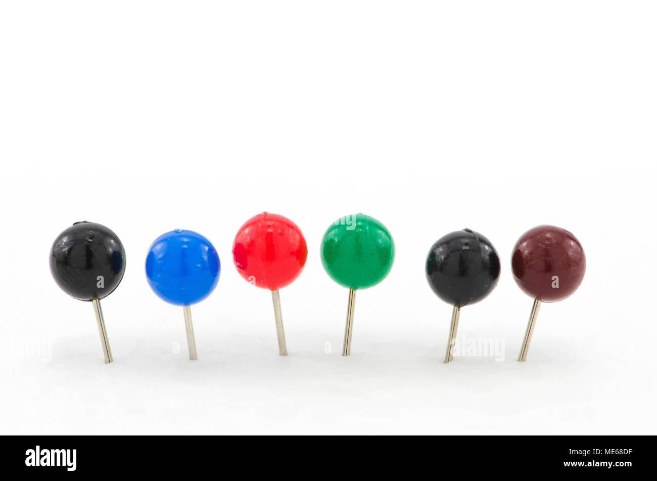 Colorful paper pins with conceptual words. Isolated on white background ...