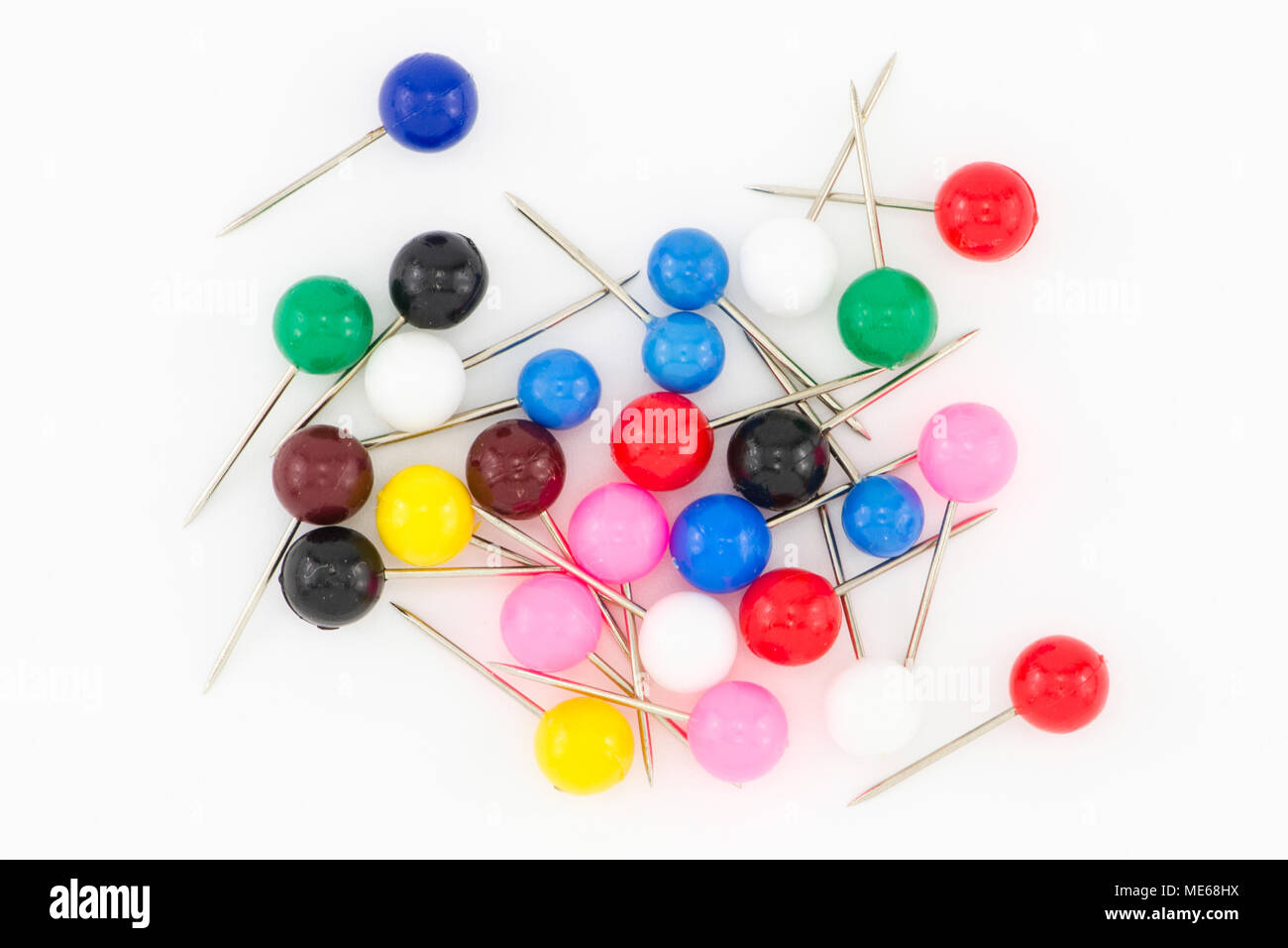 Colorful paper pins with conceptual words. Isolated on white background ...