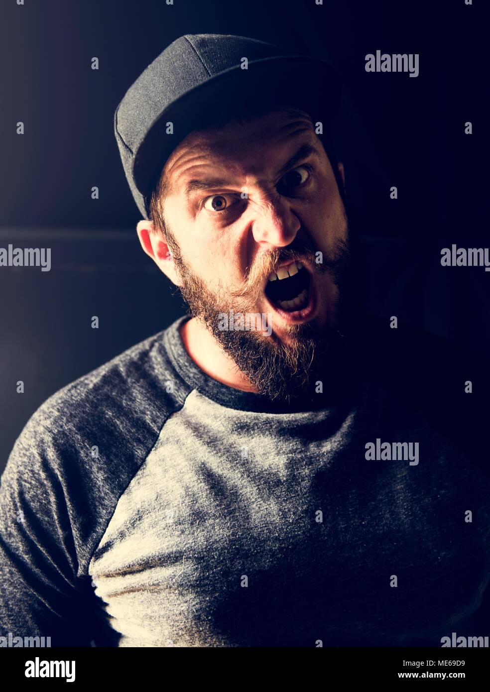 A man with screaming face expression Stock Photo - Alamy