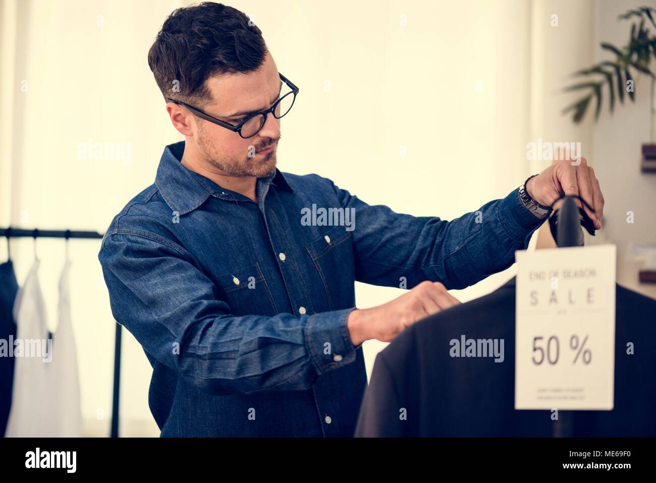 Working in retail hi-res stock photography and images - Alamy