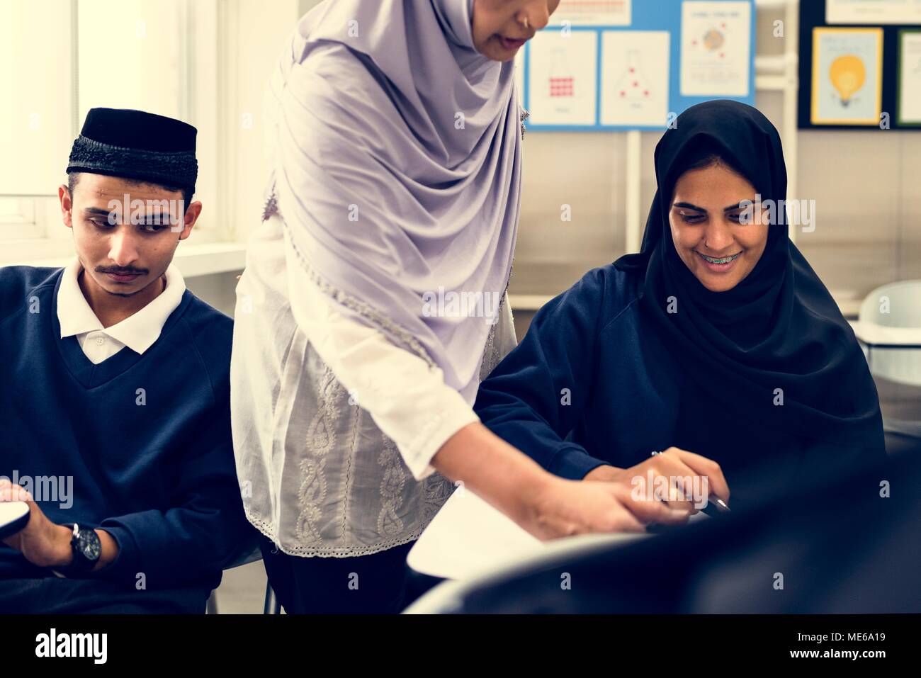 diverse muslim children studying in classroom Stock Photo - Alamy