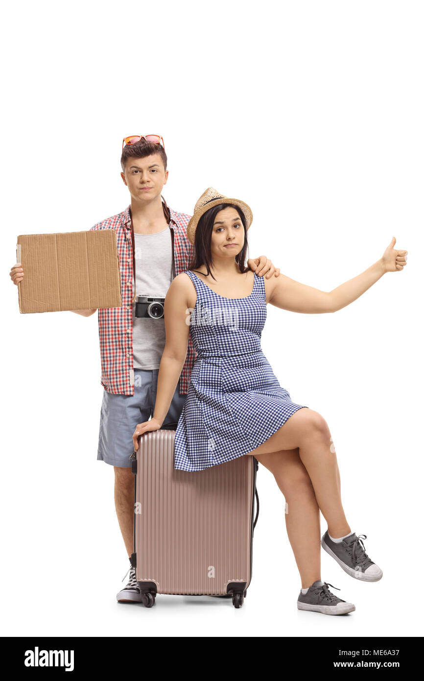 Sad teenage tourists with a blank cardboard sign hitchhiking isolated ...