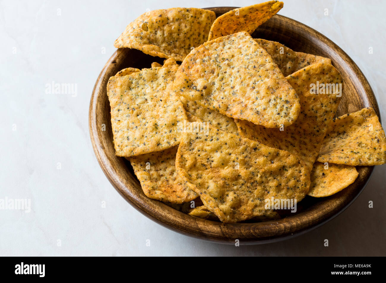 Triangle Corn Chips with Poppy Seeds. Turkish Snackers Stock Photo - Alamy