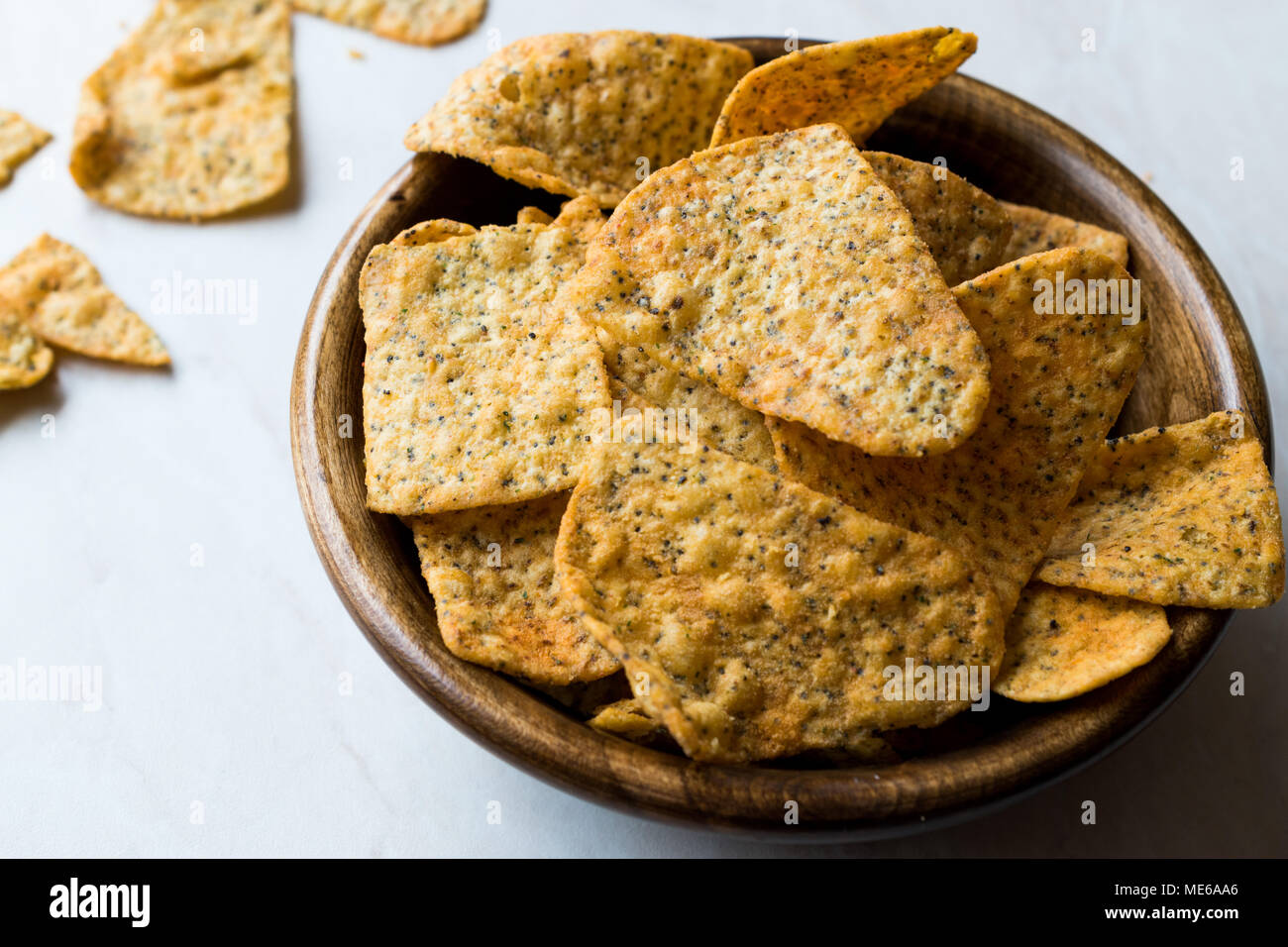 Triangle Corn Chips with Poppy Seeds. Turkish Snackers Stock Photo - Alamy