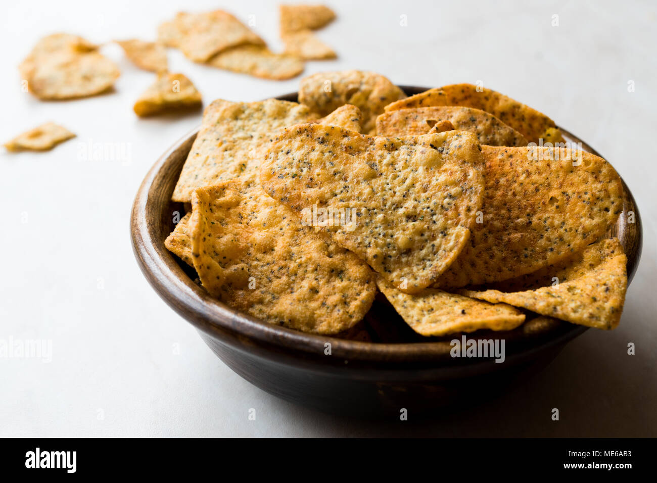 Triangle Corn Chips with Poppy Seeds. Turkish Snackers Stock Photo - Alamy