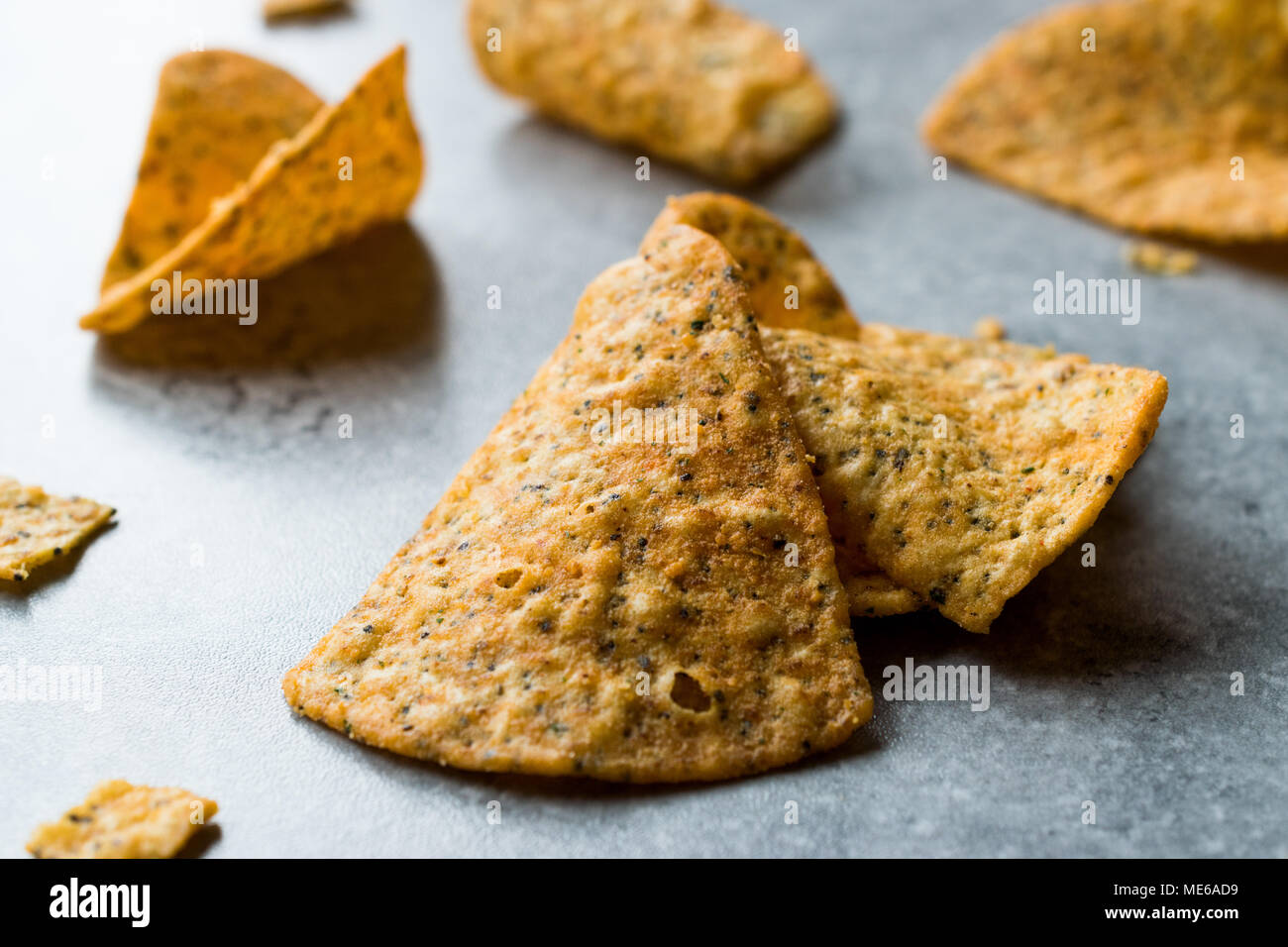 Triangle Corn Chips with Poppy Seeds. Turkish Snackers Stock Photo - Alamy