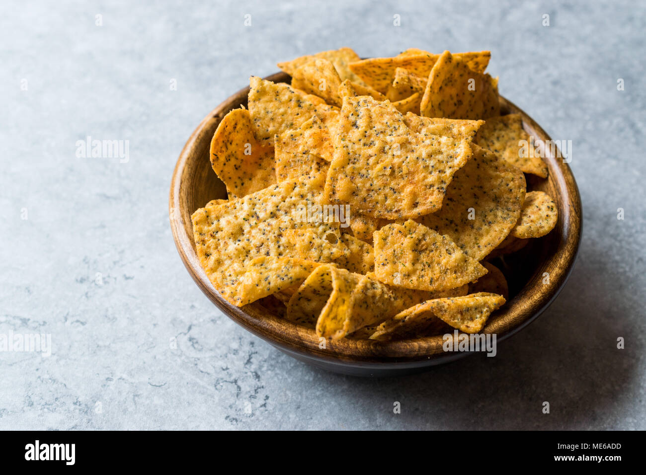 Triangle Corn Chips with Poppy Seeds. Turkish Snackers Stock Photo - Alamy