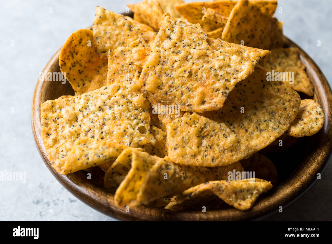 Triangle Corn Chips with Poppy Seeds. Turkish Snackers Stock Photo - Alamy