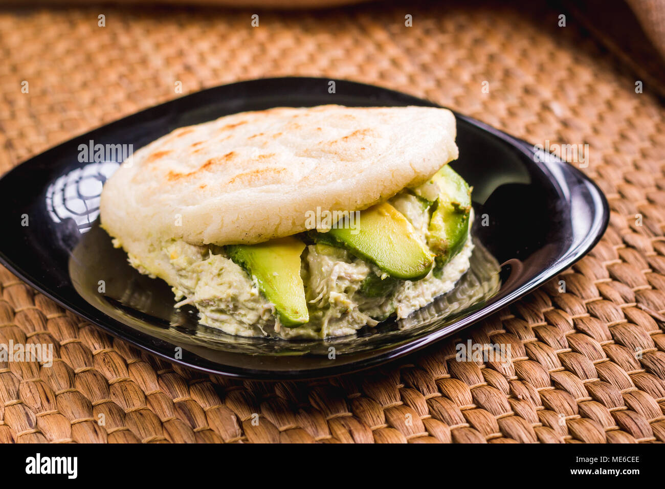 Venezuelan breakfast, Arepa, corn tortilla with chicken and avocado ...