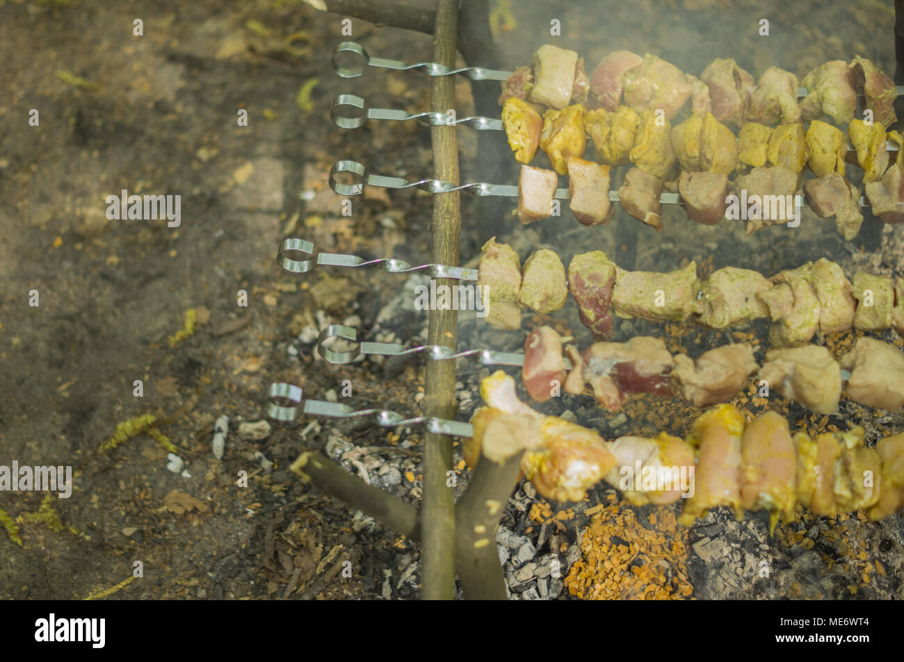 Process of preparation of a shish kebab, from uncooked to the cooked ...