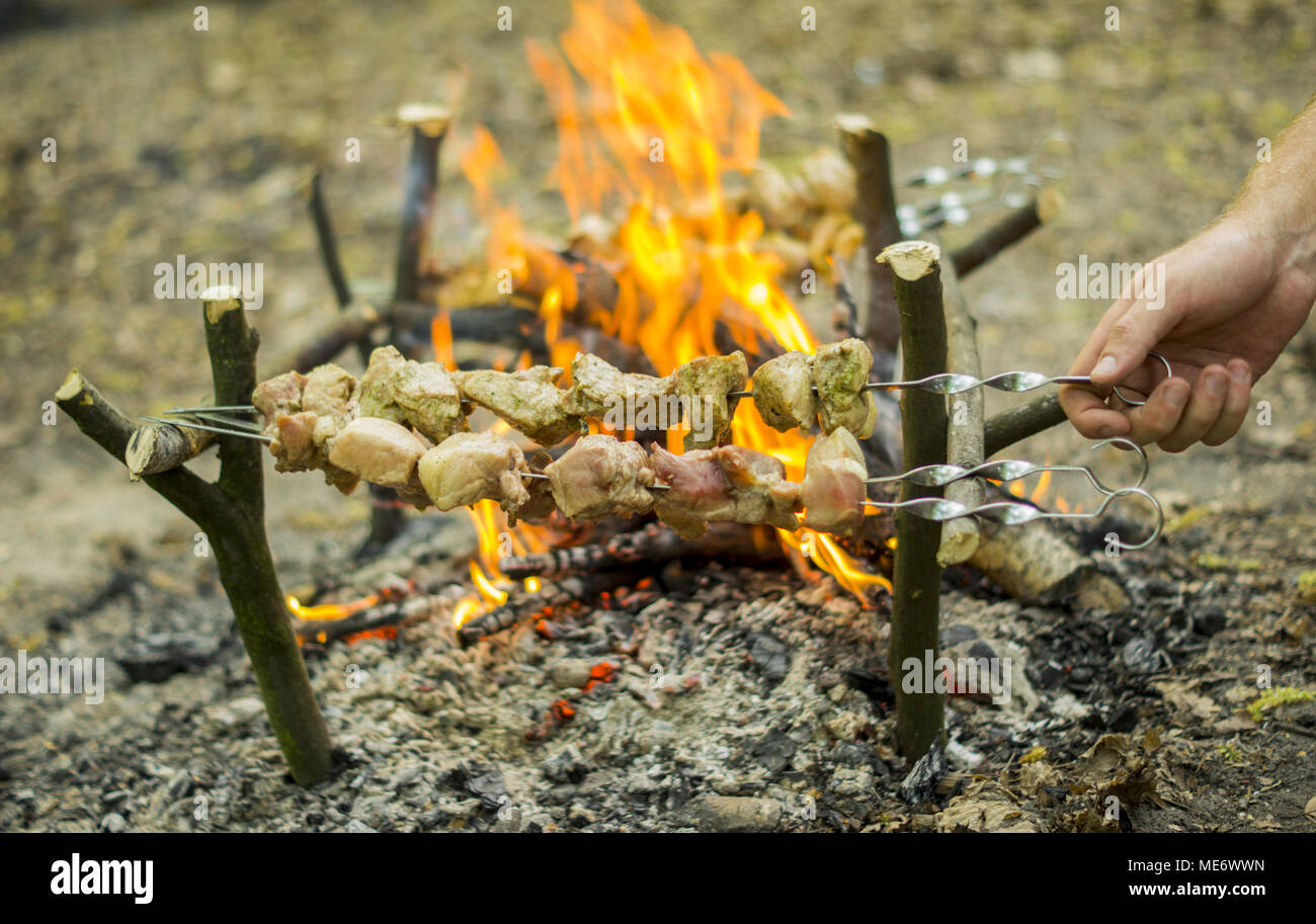 Process of preparation of a shish kebab, from uncooked to the cooked ...