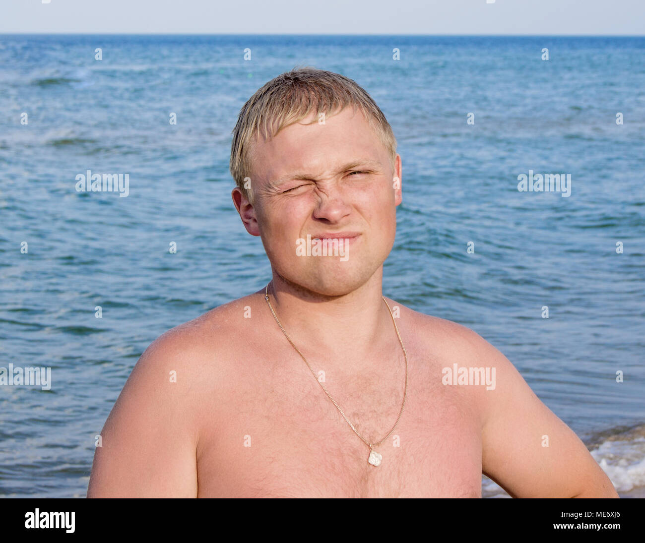 Blond young man model beach hi-res stock photography and images - Alamy