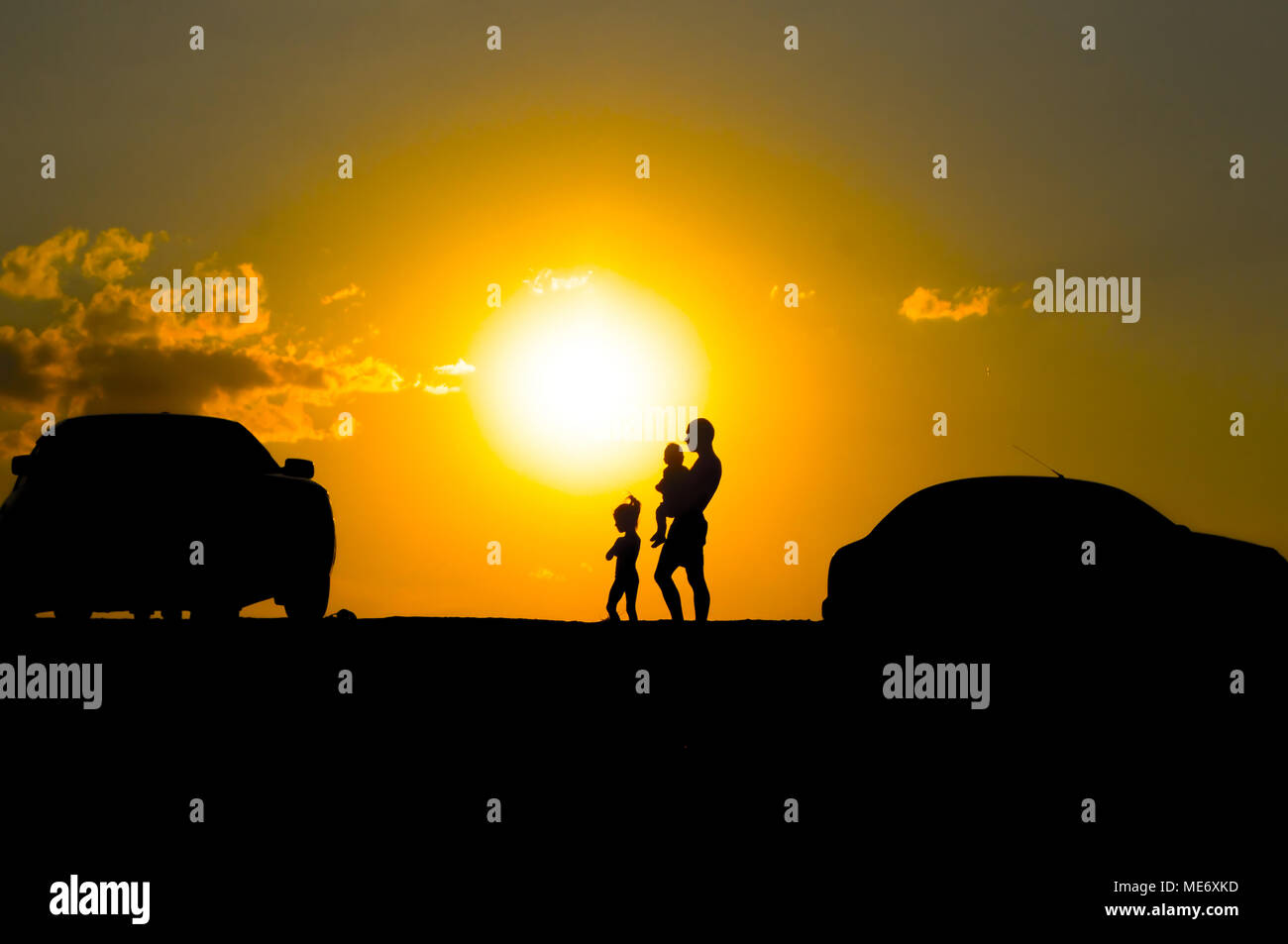happy family of three people,celebrate outside at Sunset, Silhouette ...