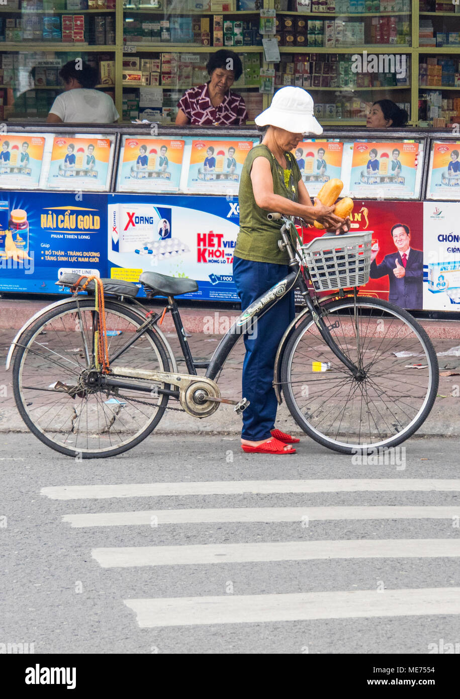 Female asian cyclist hi-res stock photography and images - Alamy