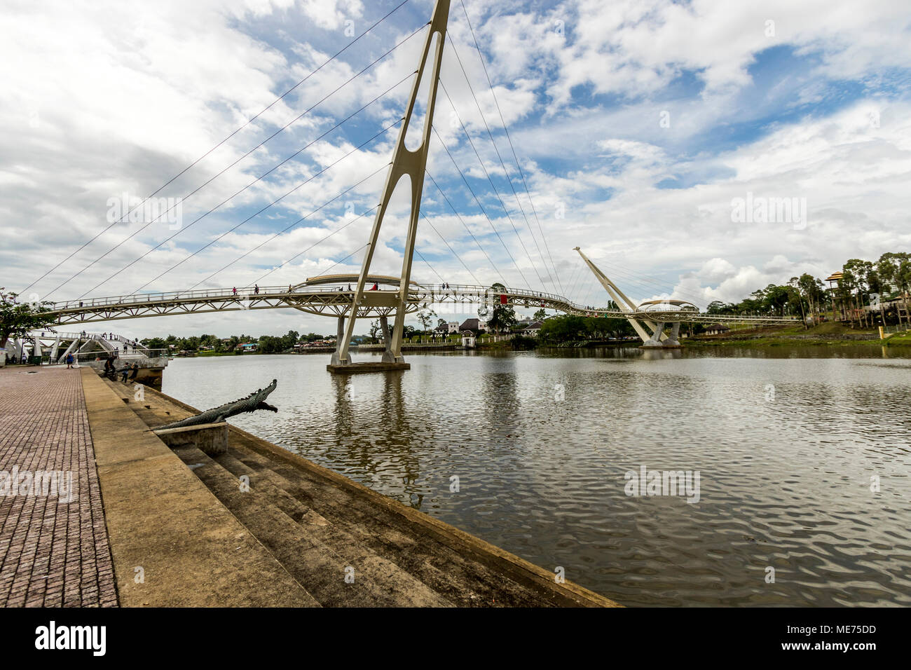 Darul Hana bridge or Golden Bridge in daytime over the Sarawak river in ...
