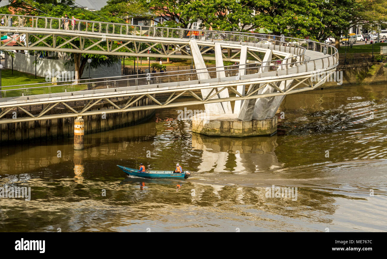 Darul Hana bridge or Golden Bridge in daytime over the Sarawak river in ...