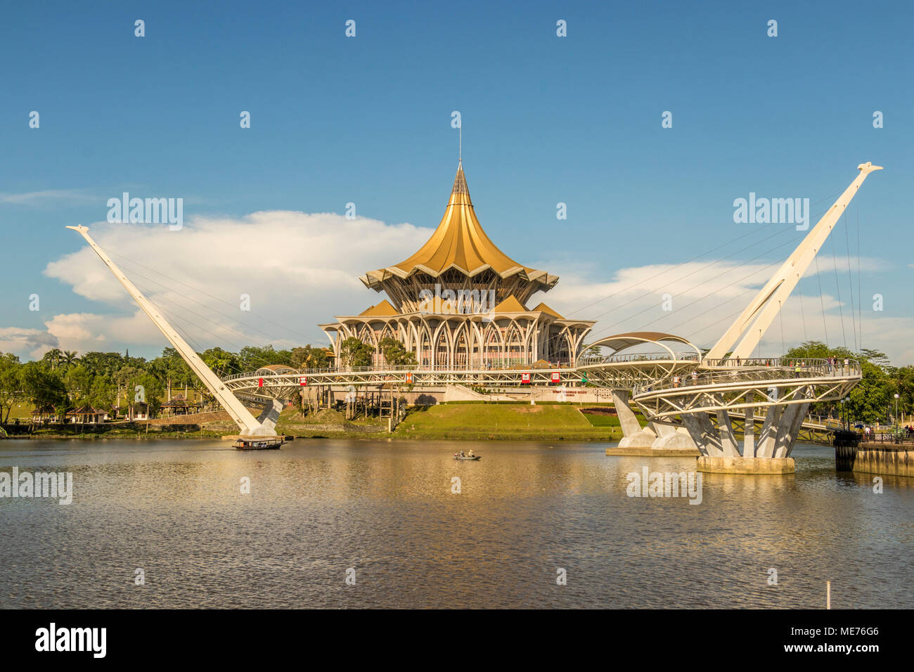 Darul Hana bridge or Golden Bridge in daytime over the Sarawak river in ...