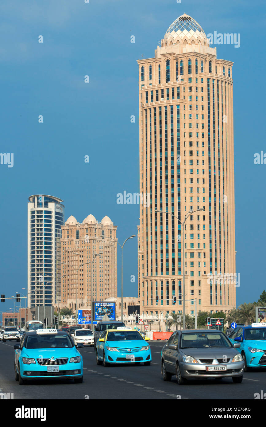 Taxis and QIA building (Qatar Investment Authority) in the West Bay ...