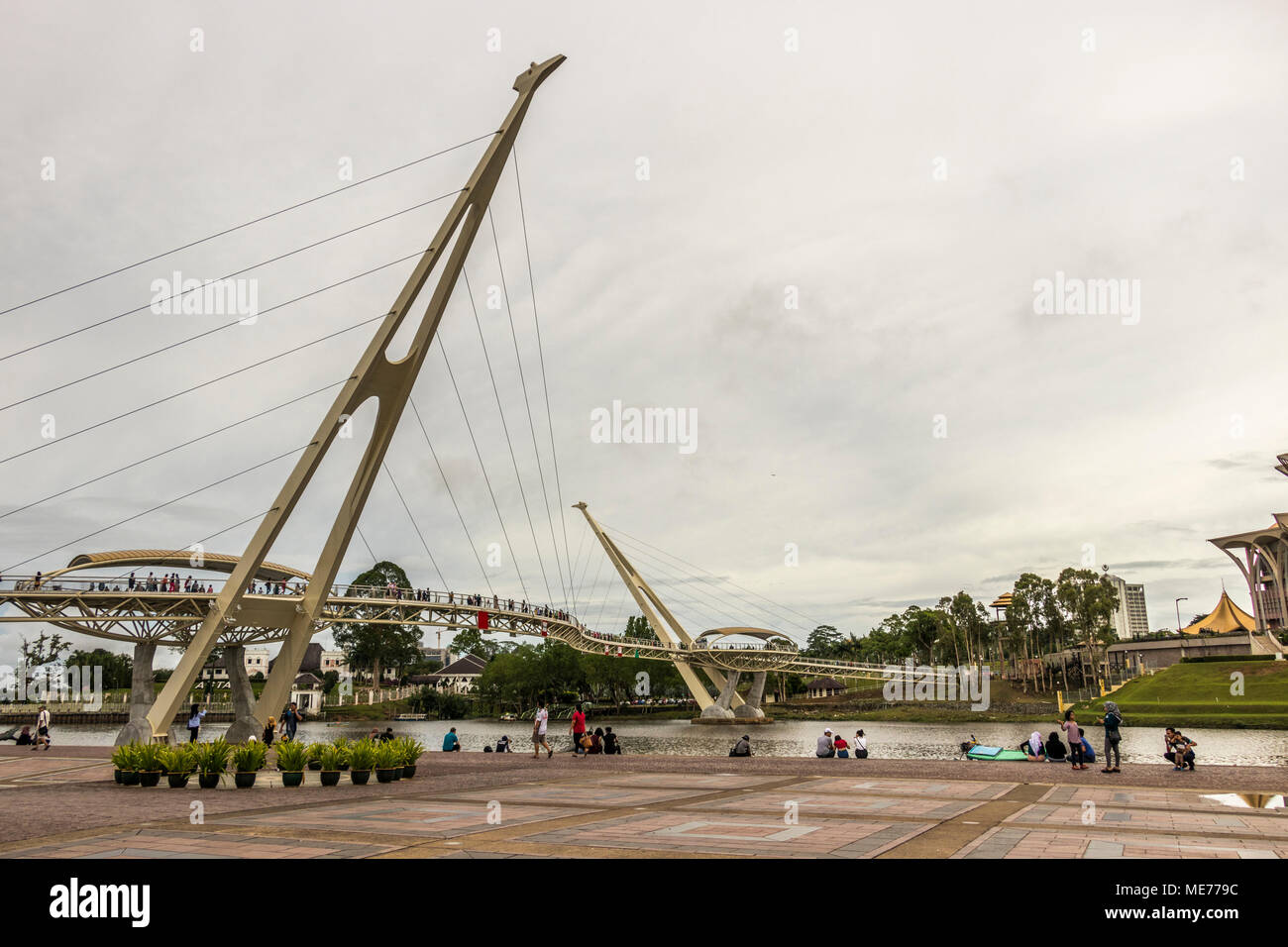 Darul Hana bridge or Golden Bridge in daytime over the Sarawak river in ...