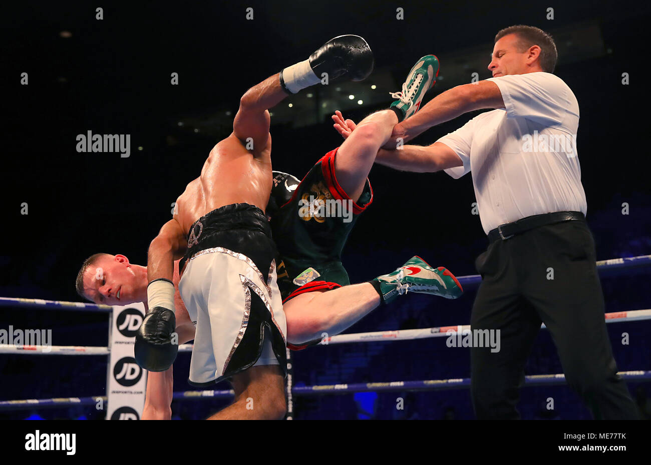Ricky Starkey (left) and Qais Ashfaq in action in the Bantamweight ...