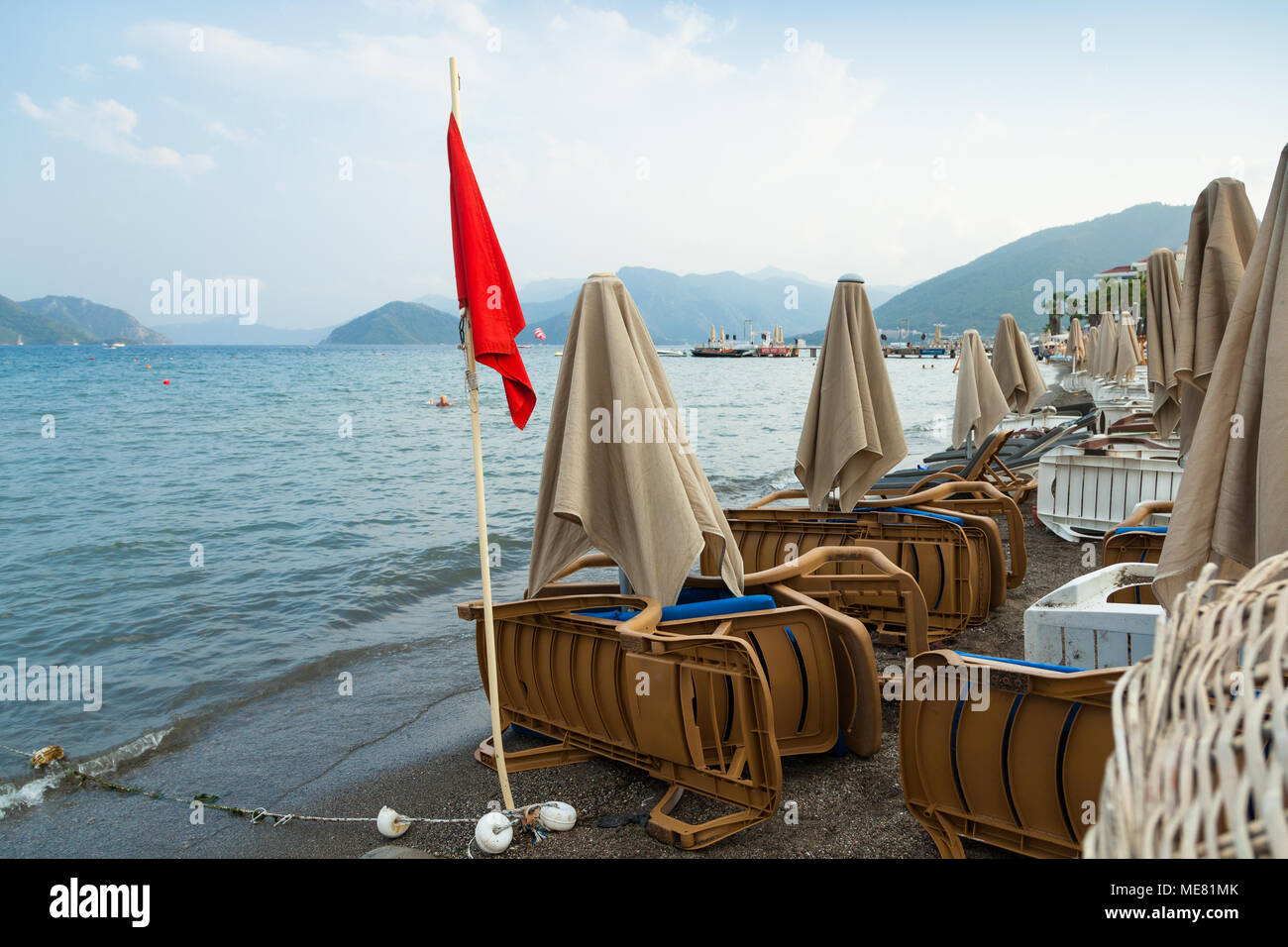 Red flag on the beach of Marmaris Stock Photo - Alamy