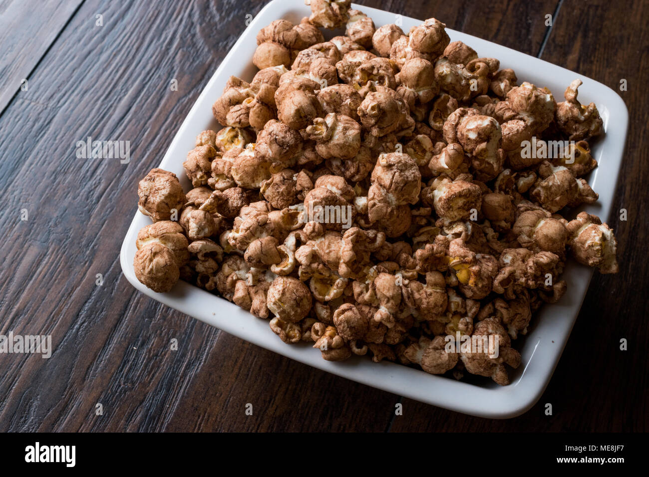 Chocolate Popcorn on dark Wooden Surface. Appetizer Food Stock Photo ...