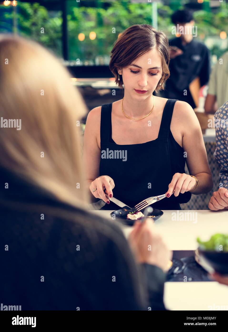 Women having lunch together Stock Photo - Alamy