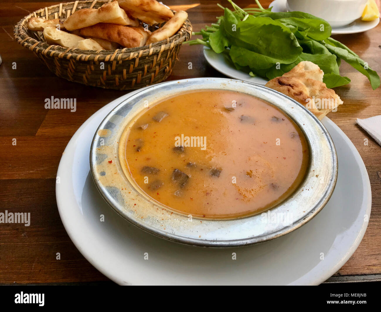 Turkish Meat Soup Kelle Paca with Rucola / Rocket Leaves and Pide Pita ...