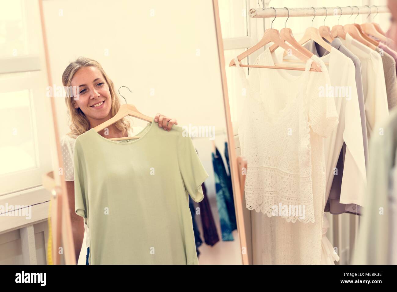 Mirror try clothes hi-res stock photography and images - Alamy