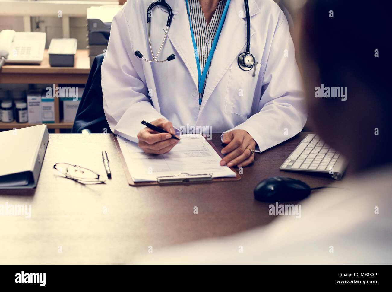 Patient meeting a doctor Stock Photo - Alamy