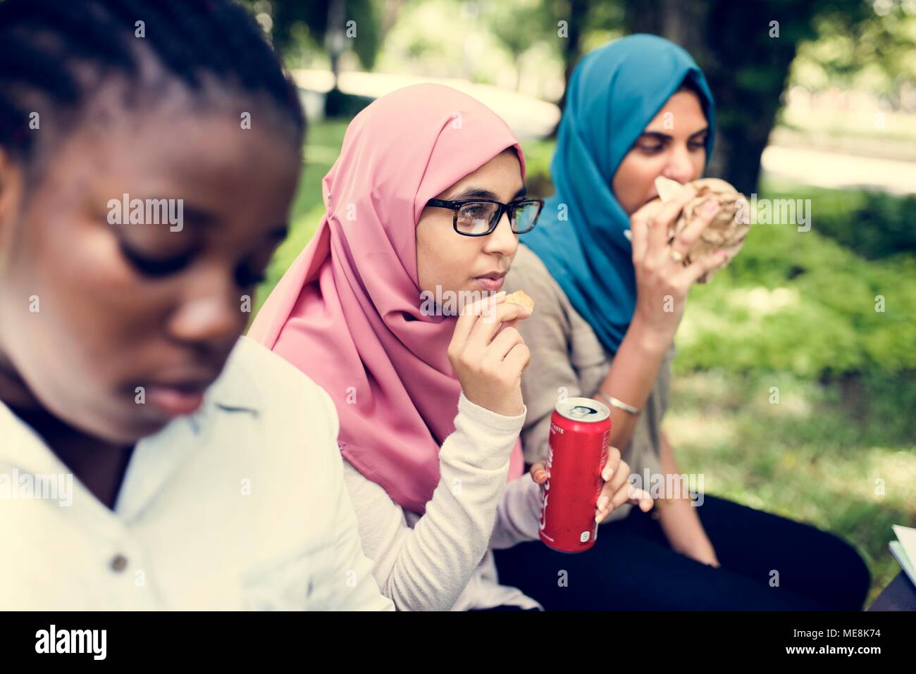 A group of diverse students are having lunch together Stock Photo - Alamy