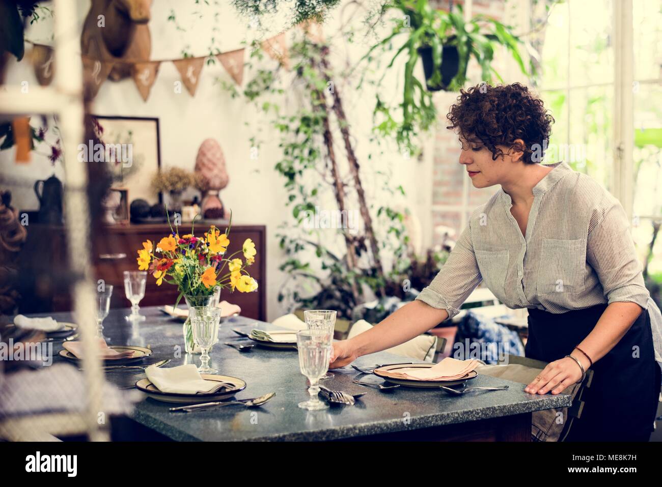 Waitress seats customers restaurant hi-res stock photography and images ...
