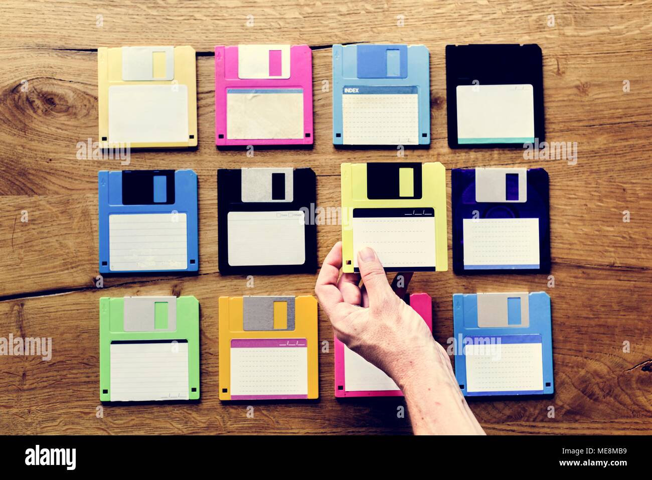 Hand holding floppy disk hi-res stock photography and images - Alamy