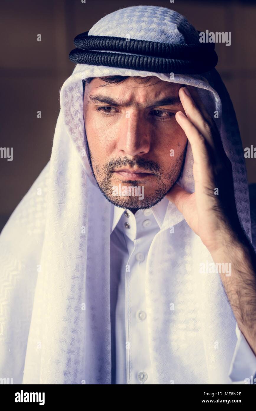 Arab man with thoughtful face expression Stock Photo - Alamy