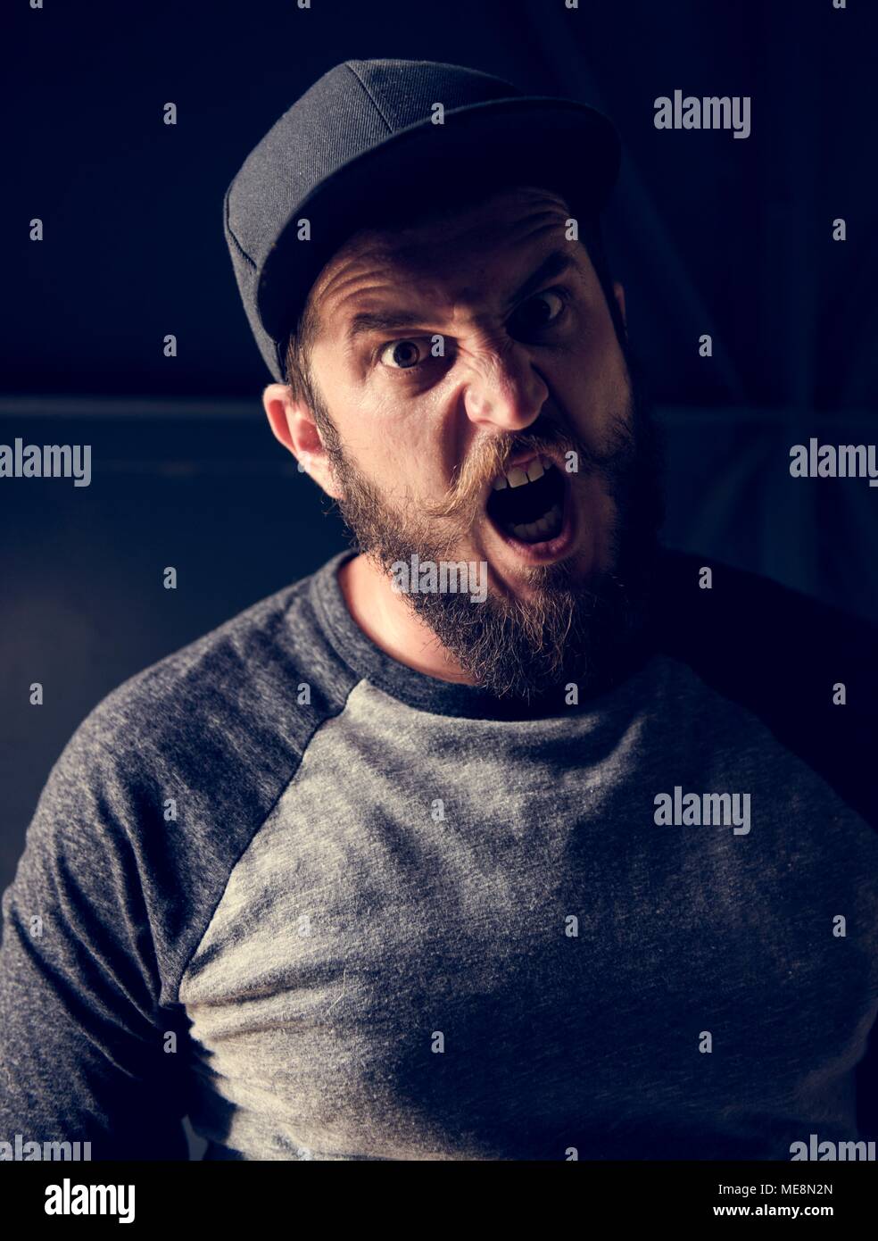 A man with screaming face expression Stock Photo - Alamy
