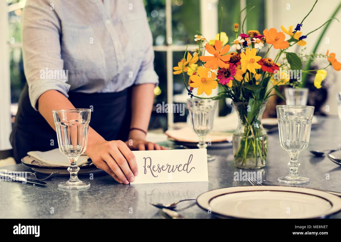 Table reserved in a cafe Stock Photo - Alamy