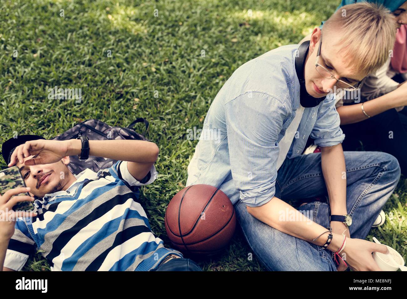 Group of young people hanging out together Stock Photo - Alamy