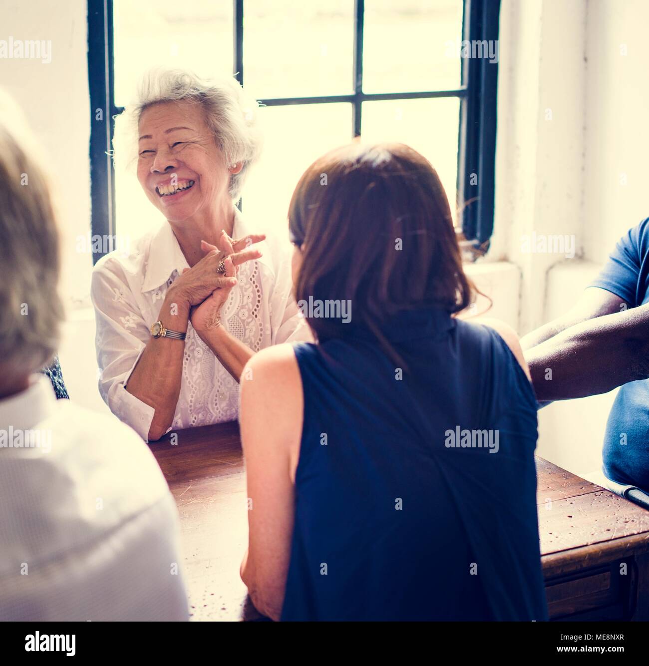 Group of diverse people gathering together support teamwork Stock Photo ...