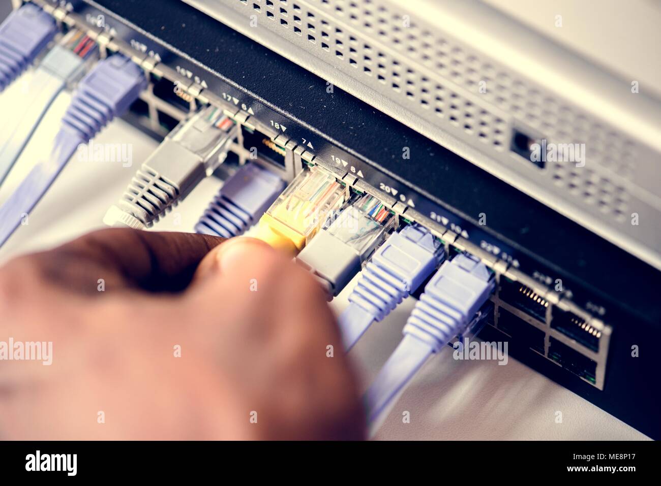 Cables connected on a hub Stock Photo - Alamy