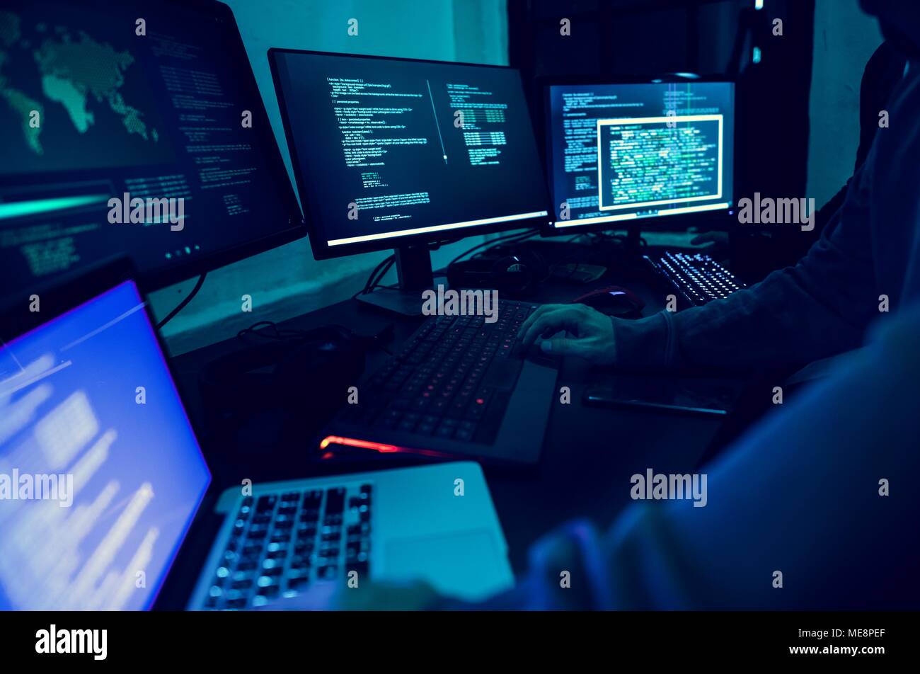 Diverse computer hacking shoot Stock Photo - Alamy