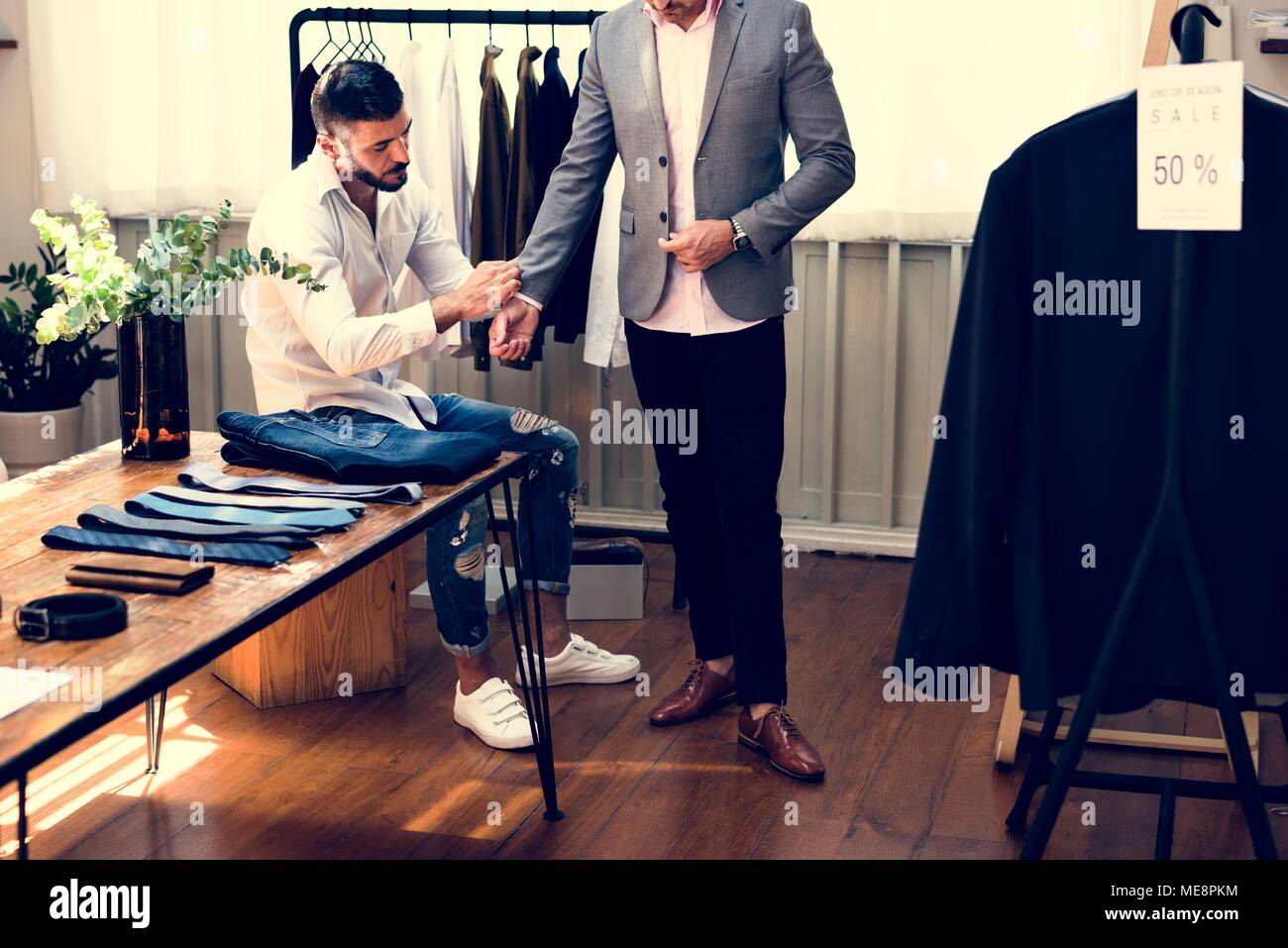 Men trying hi-res stock photography and images - Alamy