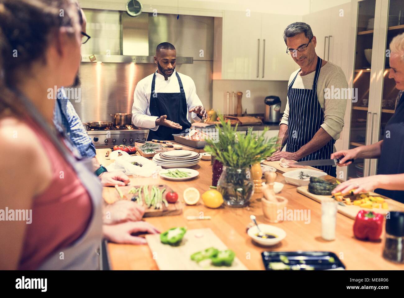 African american cooking for friends hi-res stock photography and ...