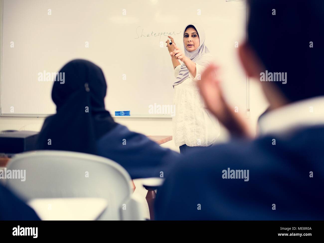 diverse muslim children studying in classroom Stock Photo - Alamy