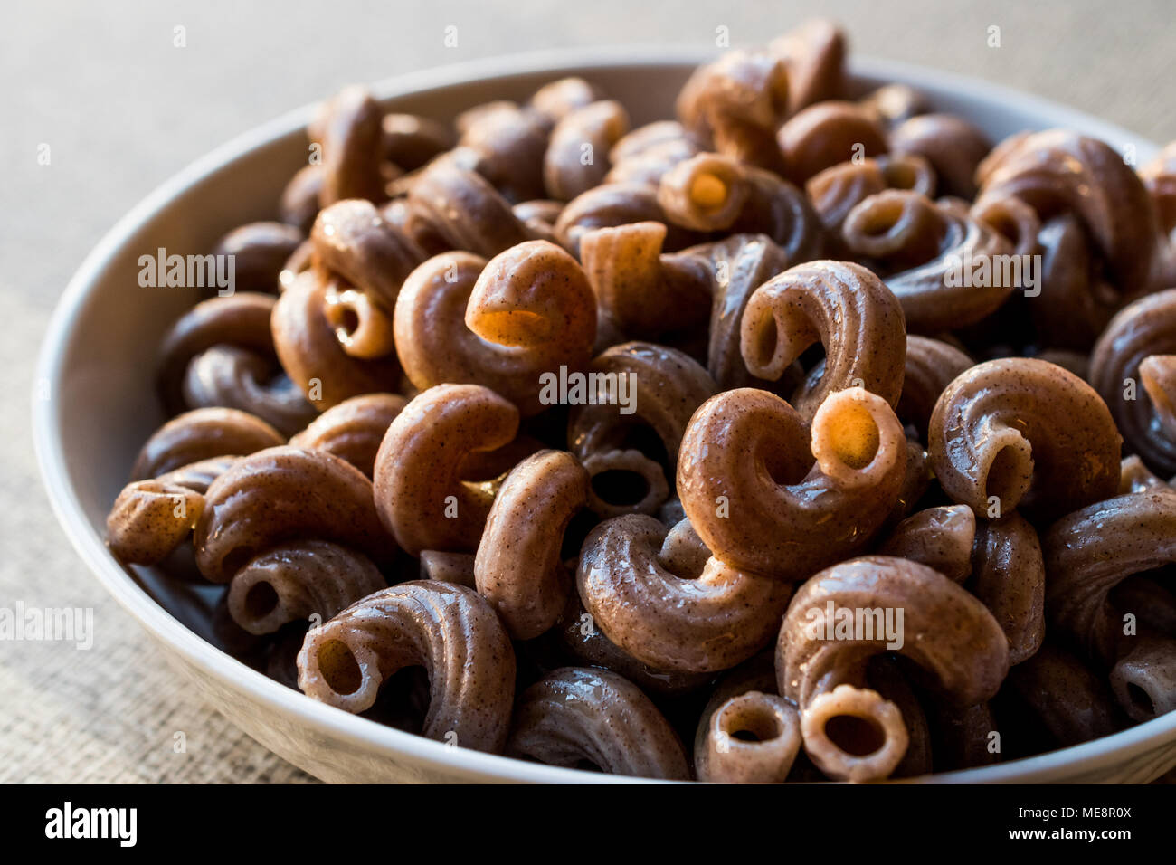 Cooked Whole Wheat Brown Pasta made with grape seeds. Organic Food ...