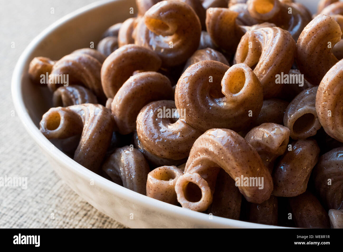 Cooked Whole Wheat Brown Pasta made with grape seeds. Organic Food ...