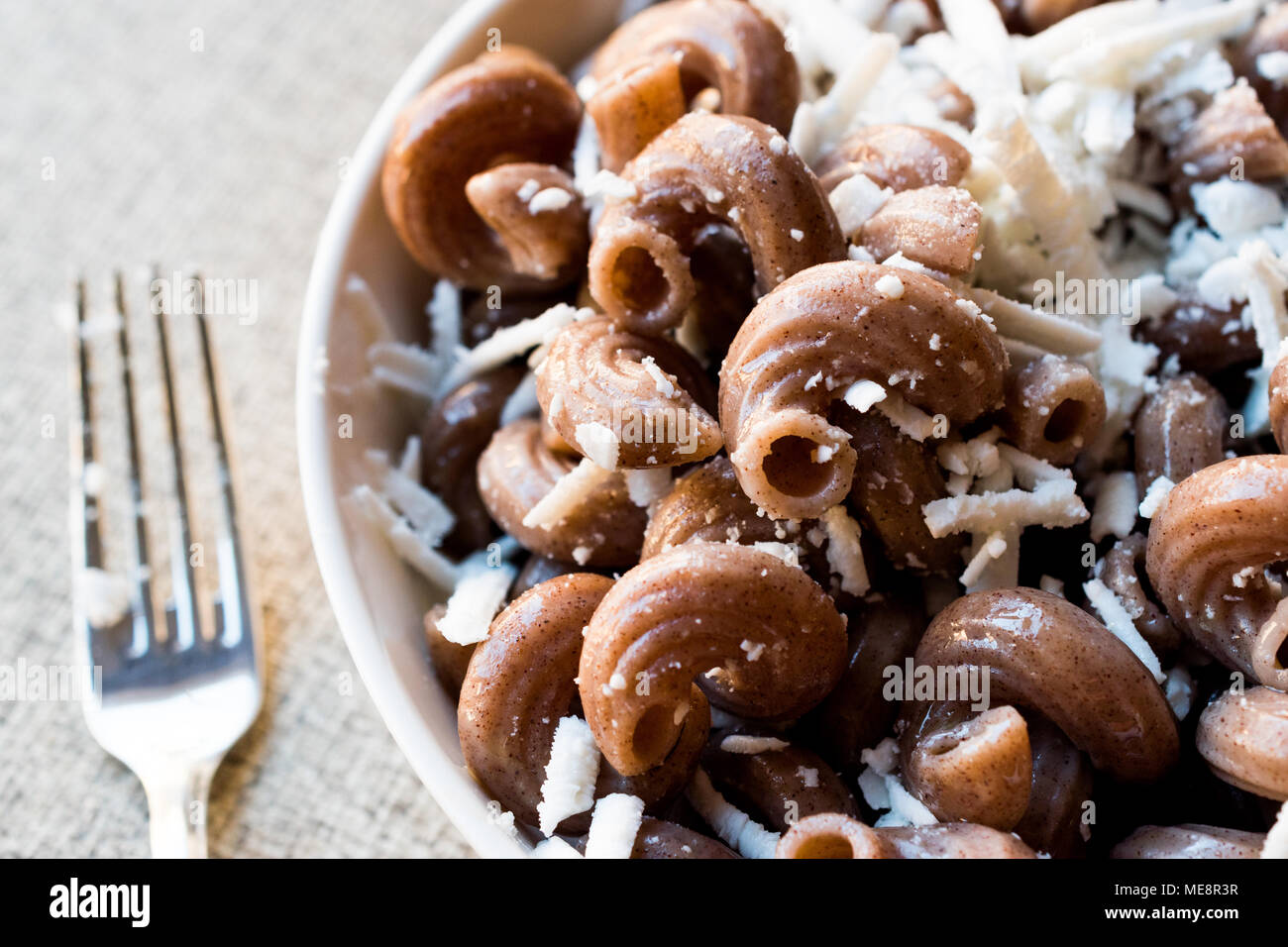 Cooked Whole Wheat Brown Pasta with cheese. Organic Food Stock Photo ...