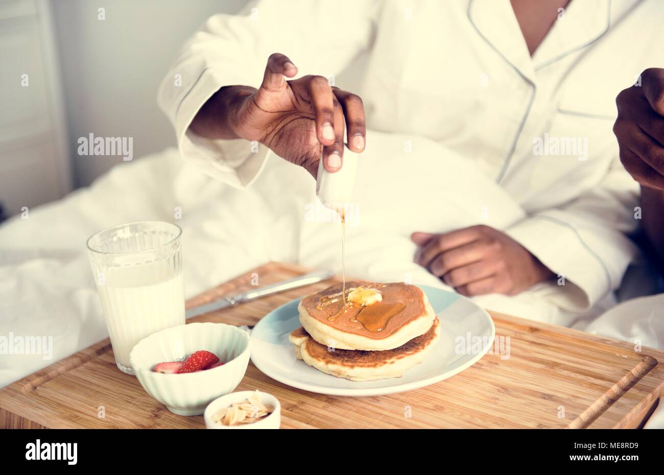 Person enjoying comfort food hi-res stock photography and images - Alamy