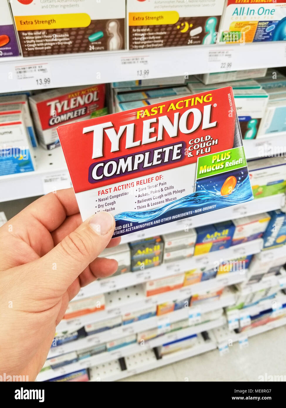 MONTREAL, CANADA - MARCH 10, 2018 : A hand holding Tylenol pack ...